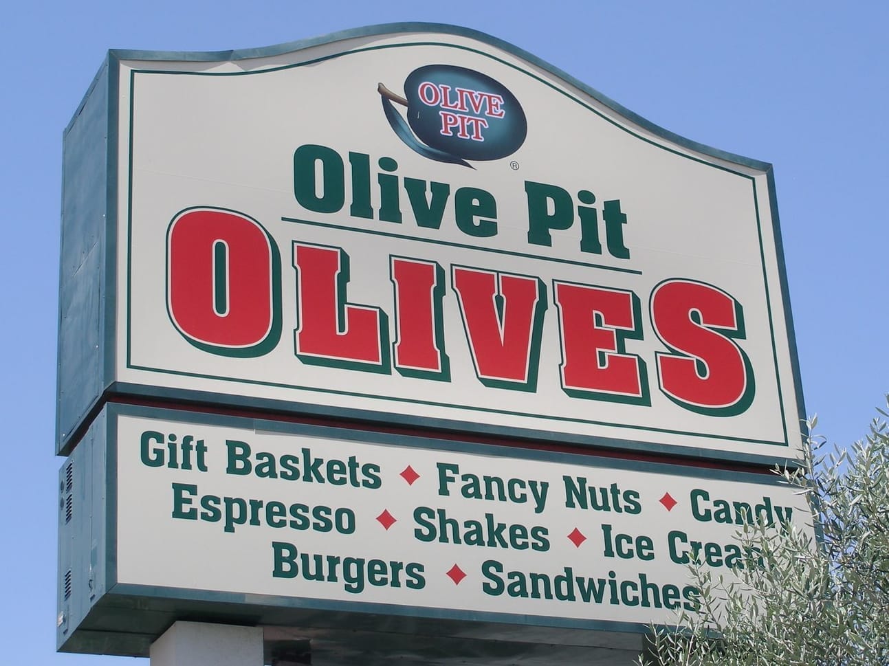 Olive Pit: Showcasing Oblong Mediterranean Fruit in Corning